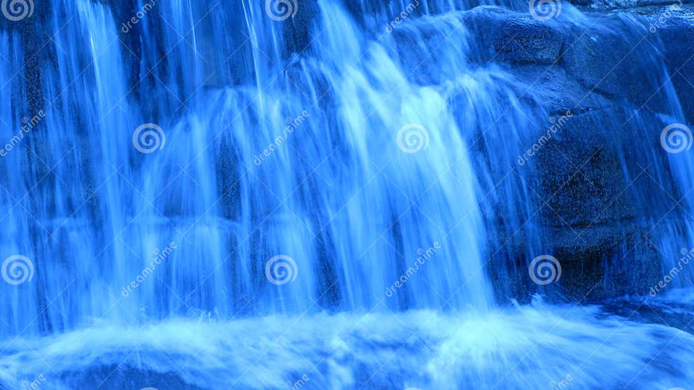Blue waterfall stock photo. Image of rocks, falls, toned - 6009978
