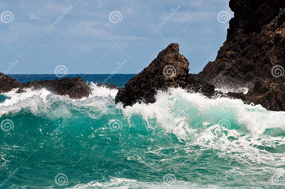 Blue Waves Crashing on Rocks Stock Photo - Image of blue, rock: 10982320