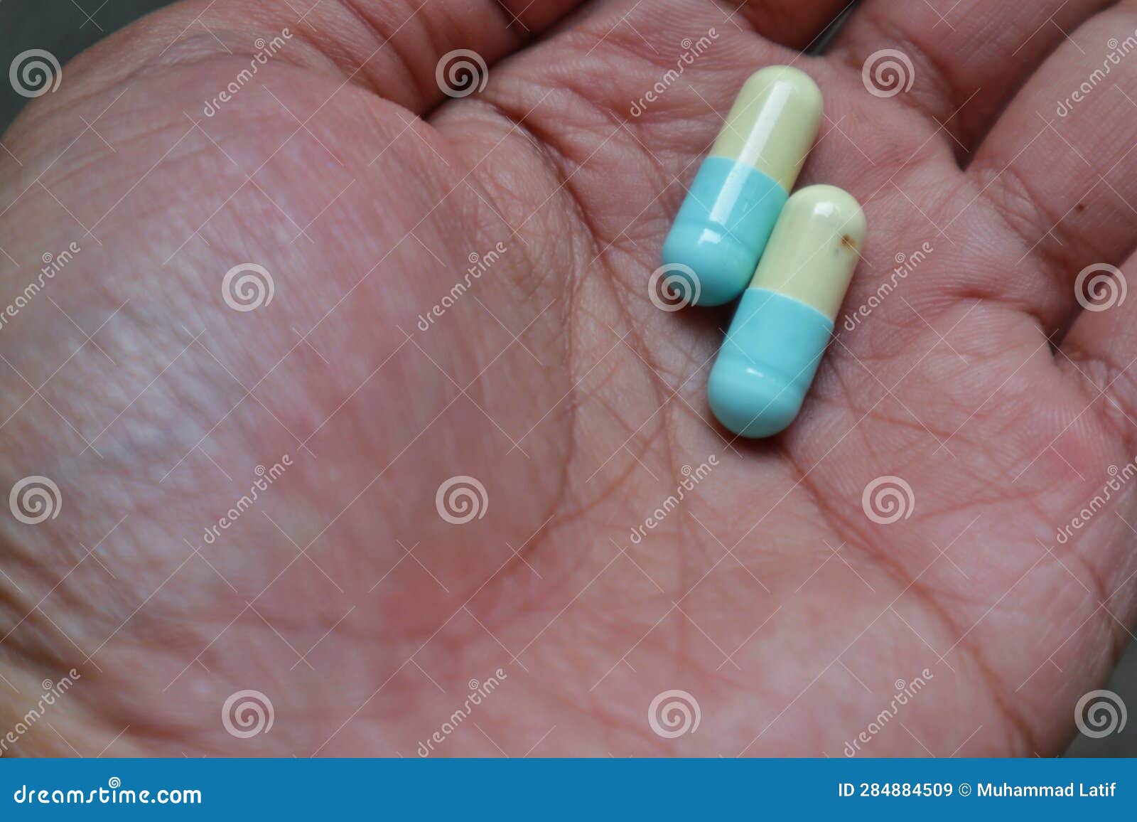 Blue and White Capsule Pill on a Hand Stock Image - Image of joint ...
