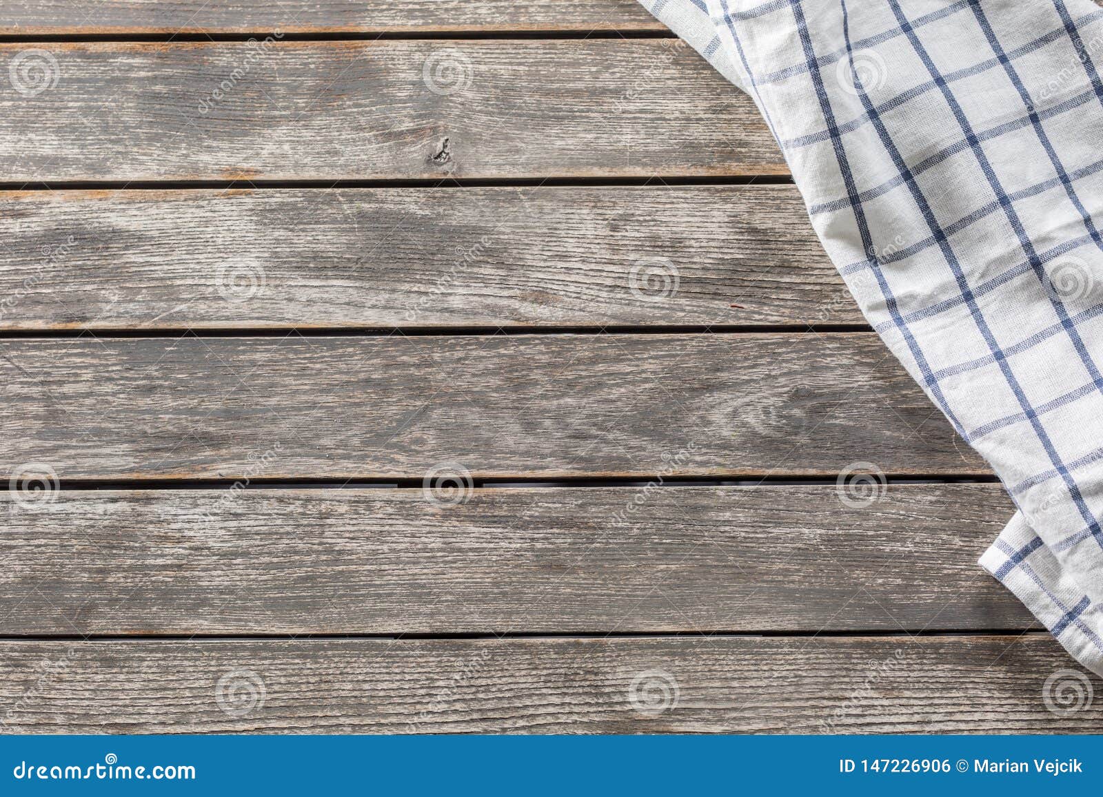 Blue White Checketed Tablecloth on Wooden Kitchen Table - Top of View ...