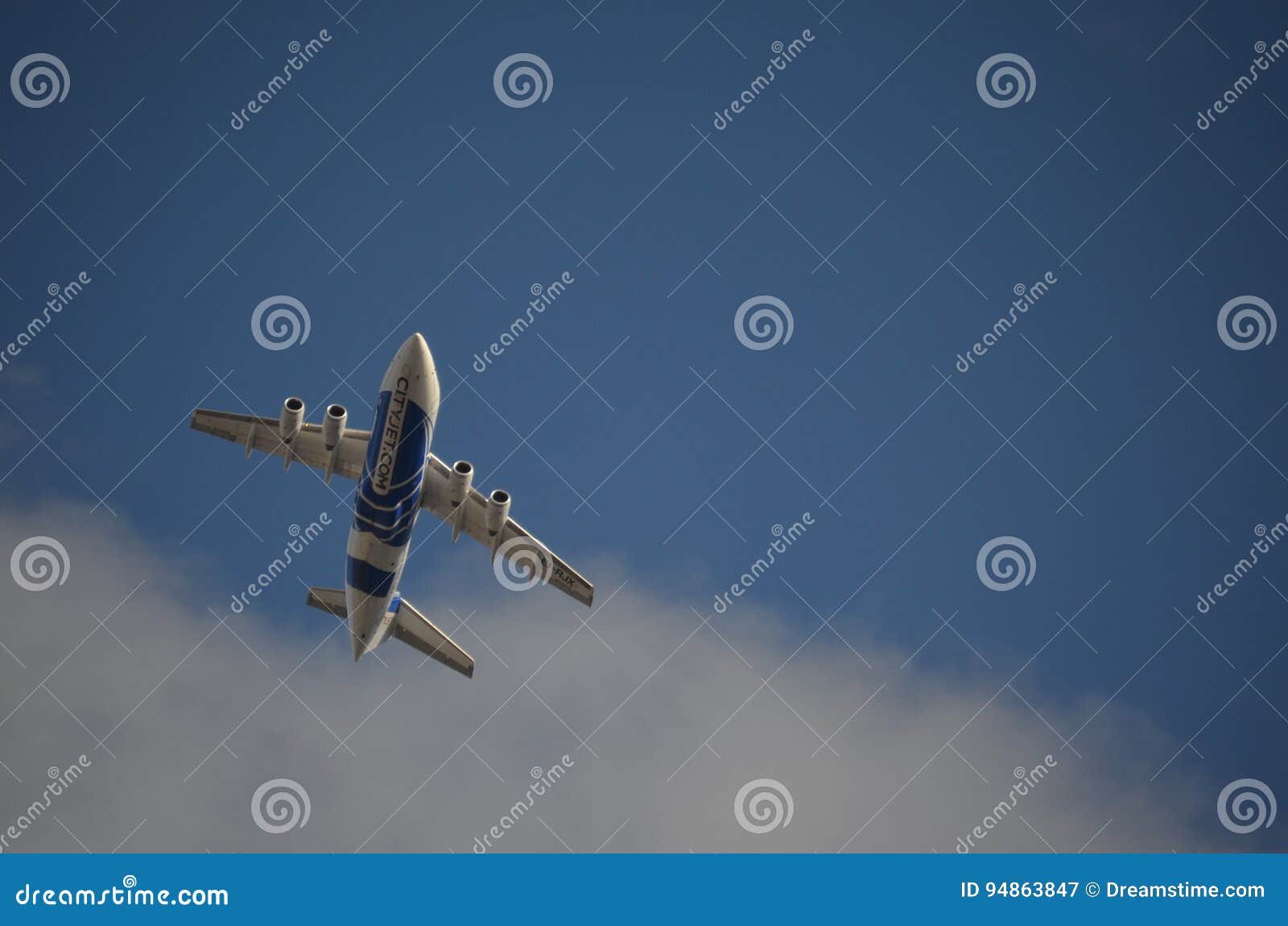 Blue and White Commercial Airplane Flying Upwards Editorial Photography ...