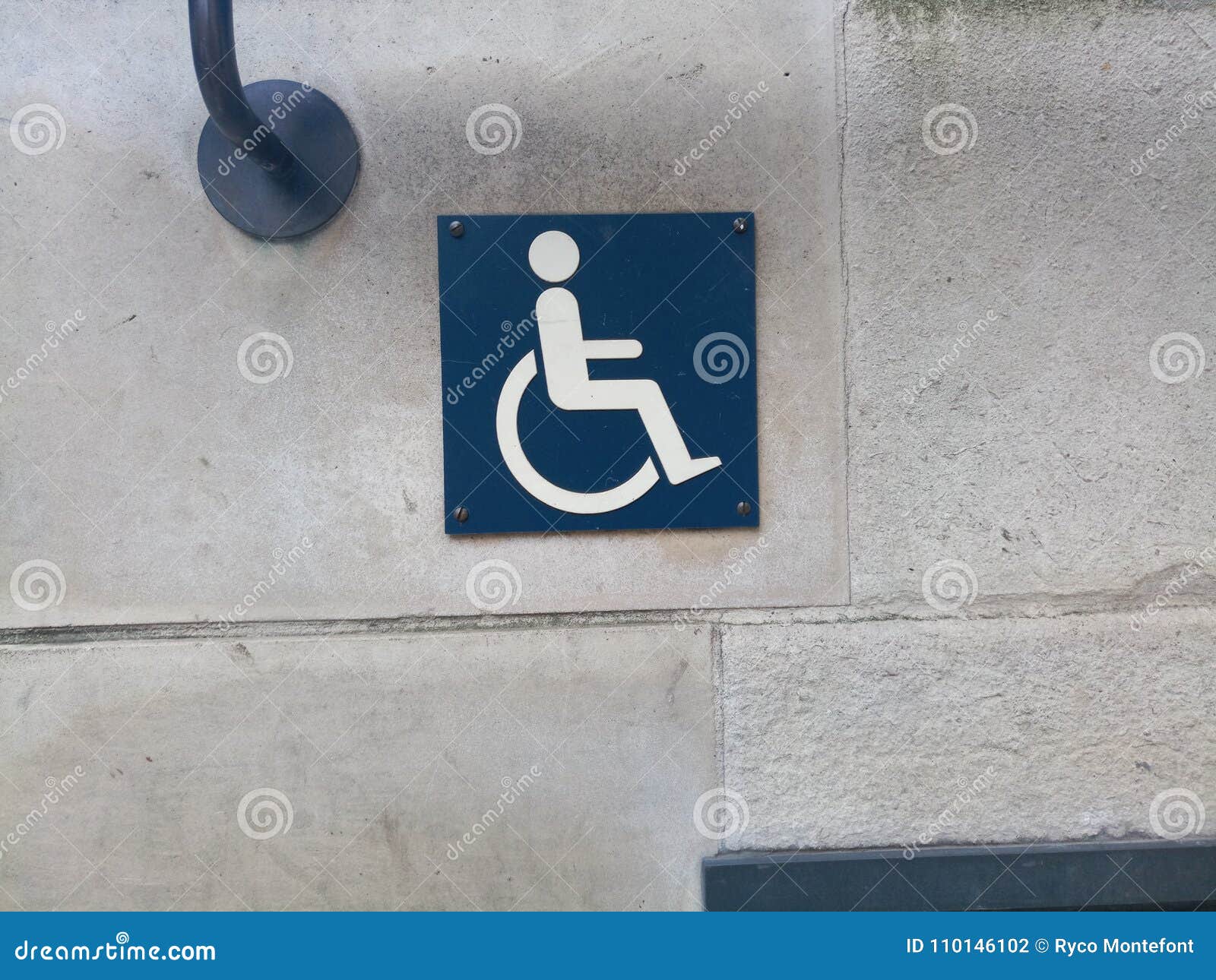 Square Disabled Sign on a Wall Stock Photo - Image of white, square ...