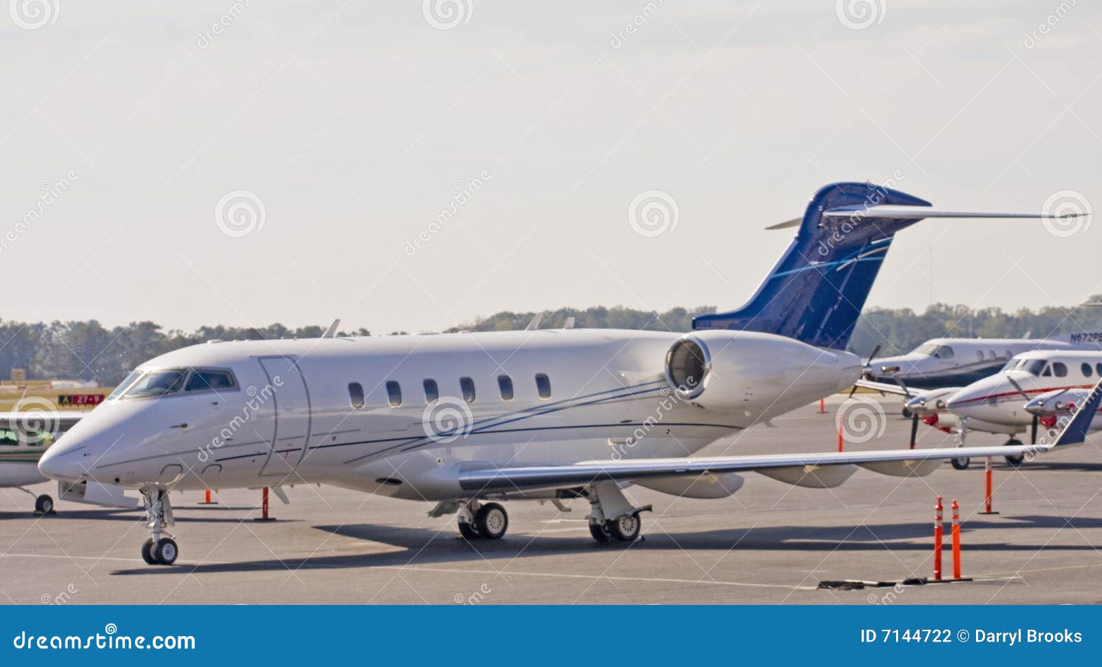 Blue and White Jet at Airport Stock Photo - Image of aircraft, airport ...