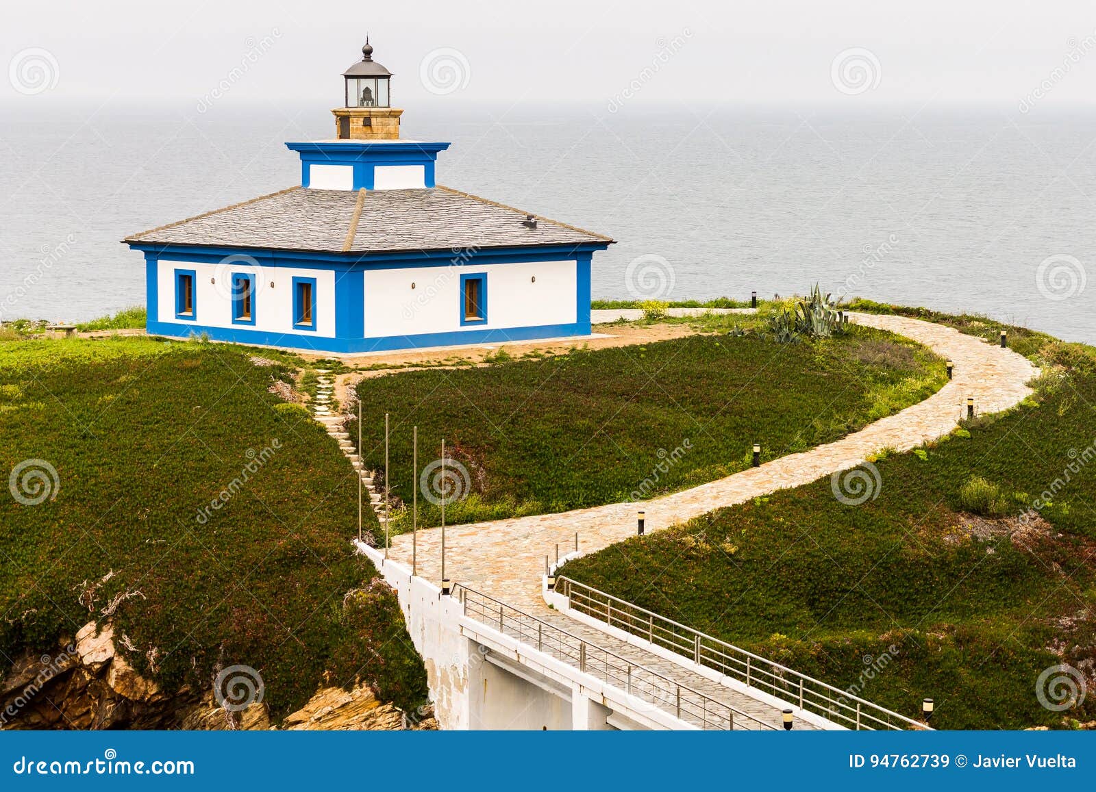 Blue and white lighthouse stock image. Image of coast - 94762739