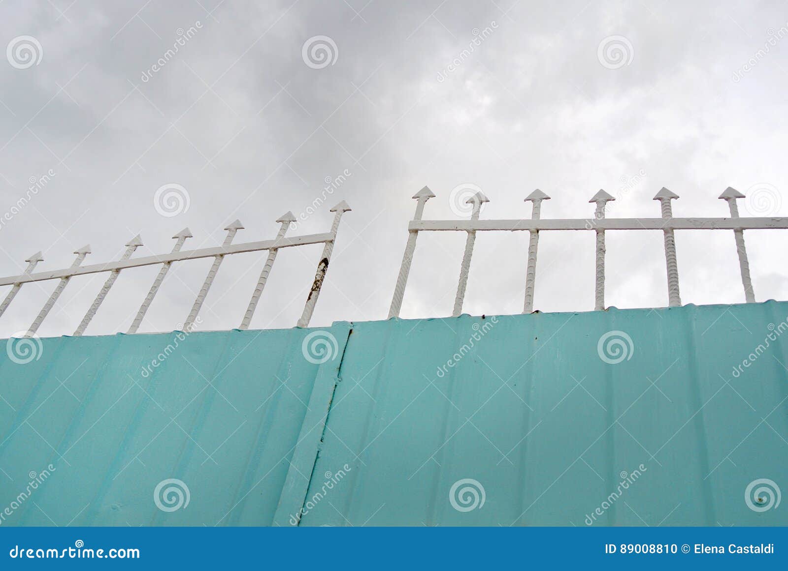 Blue and White Metallic Gate on Background Sky Stock Photo - Image of ...