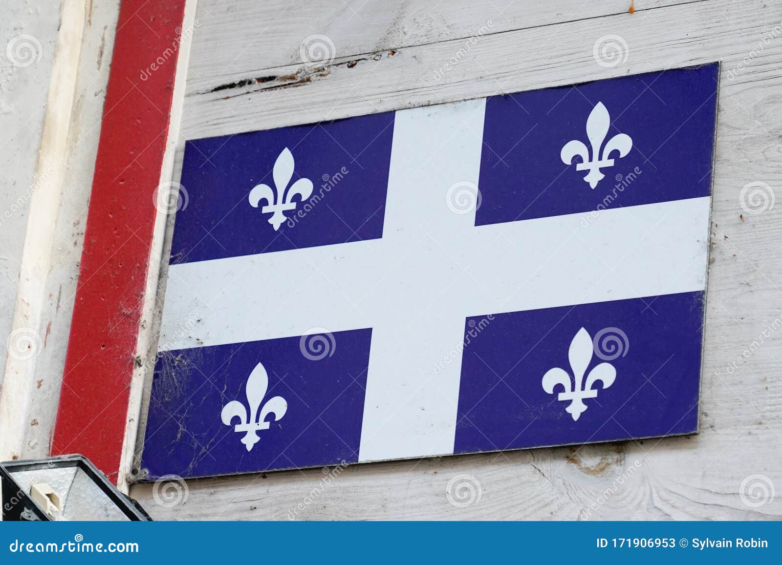 Blue and White Quebec Flag in Canada on Building Wall Stock Image ...