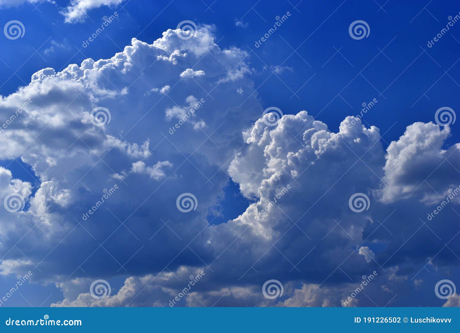White Storm Clouds Float Across The Blue Sky. Beautiful Atmospheric ...
