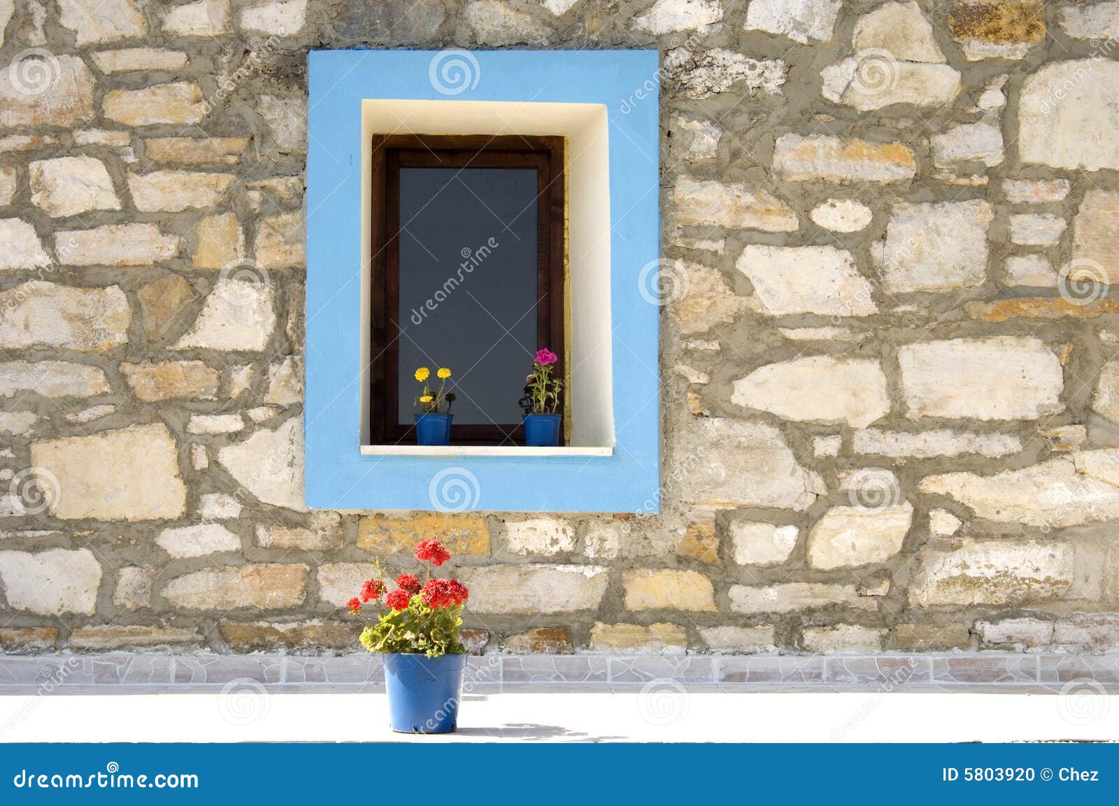 Blue Window Frame with Flowers Stock Photo - Image of rock, rocks: 5803920
