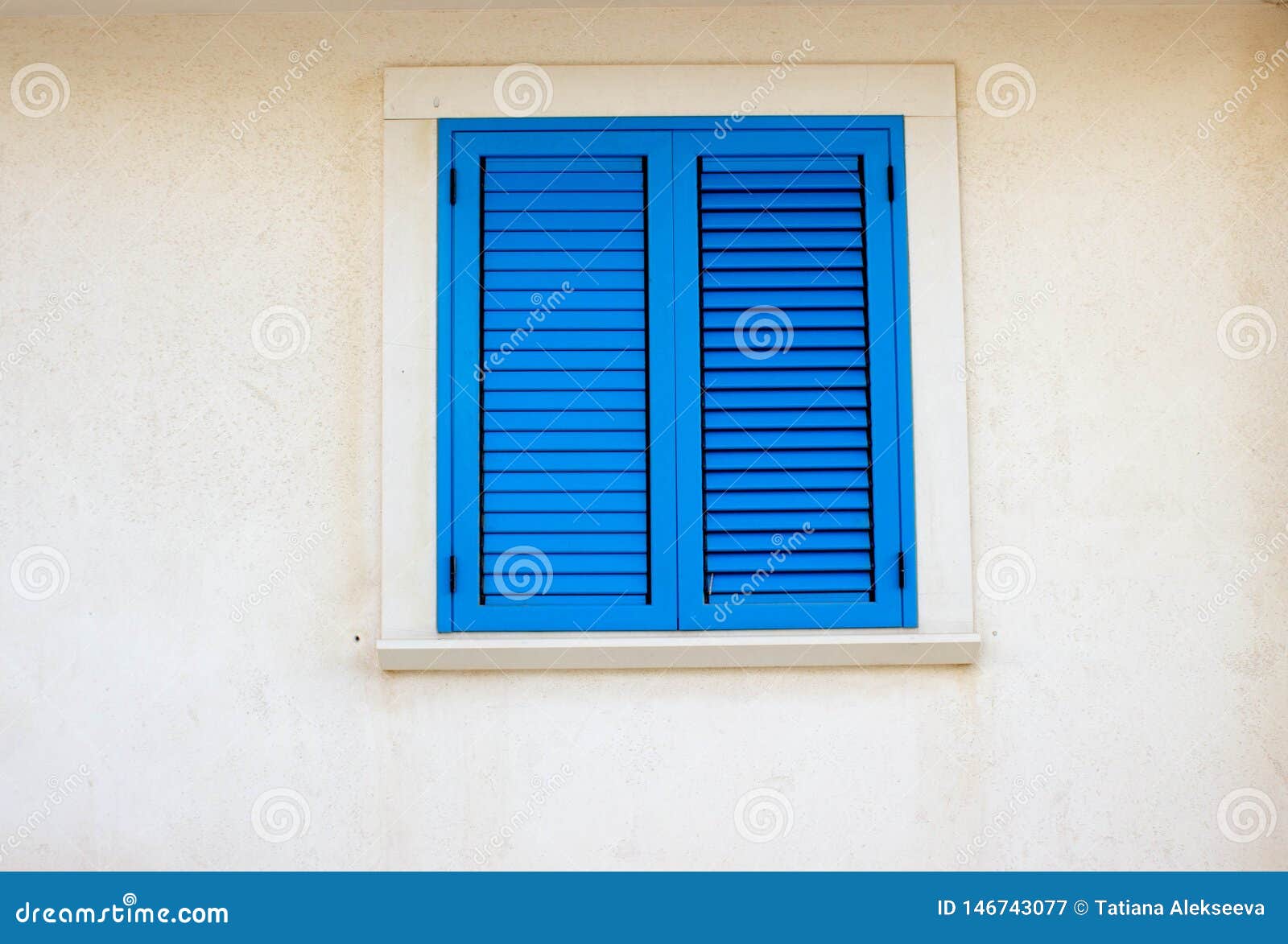 Blue window and white wall stock image. Image of exterior - 146743077