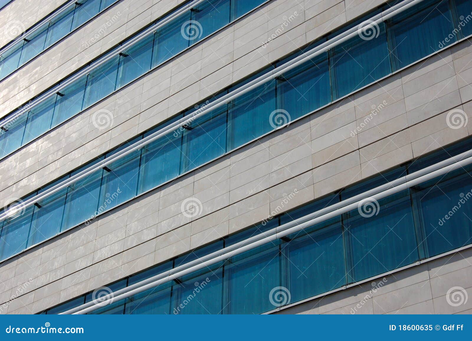 Blue Windowed Building stock image. Image of geometric - 18600635
