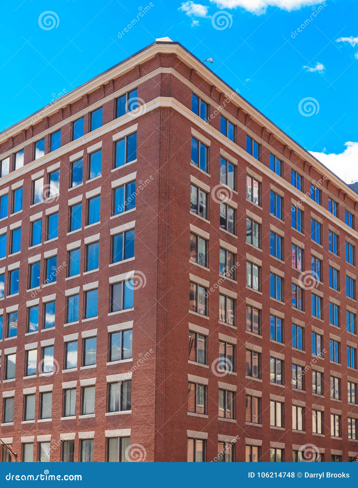 Blue Windows in Corner of Old Brick Building Stock Photo - Image of ...