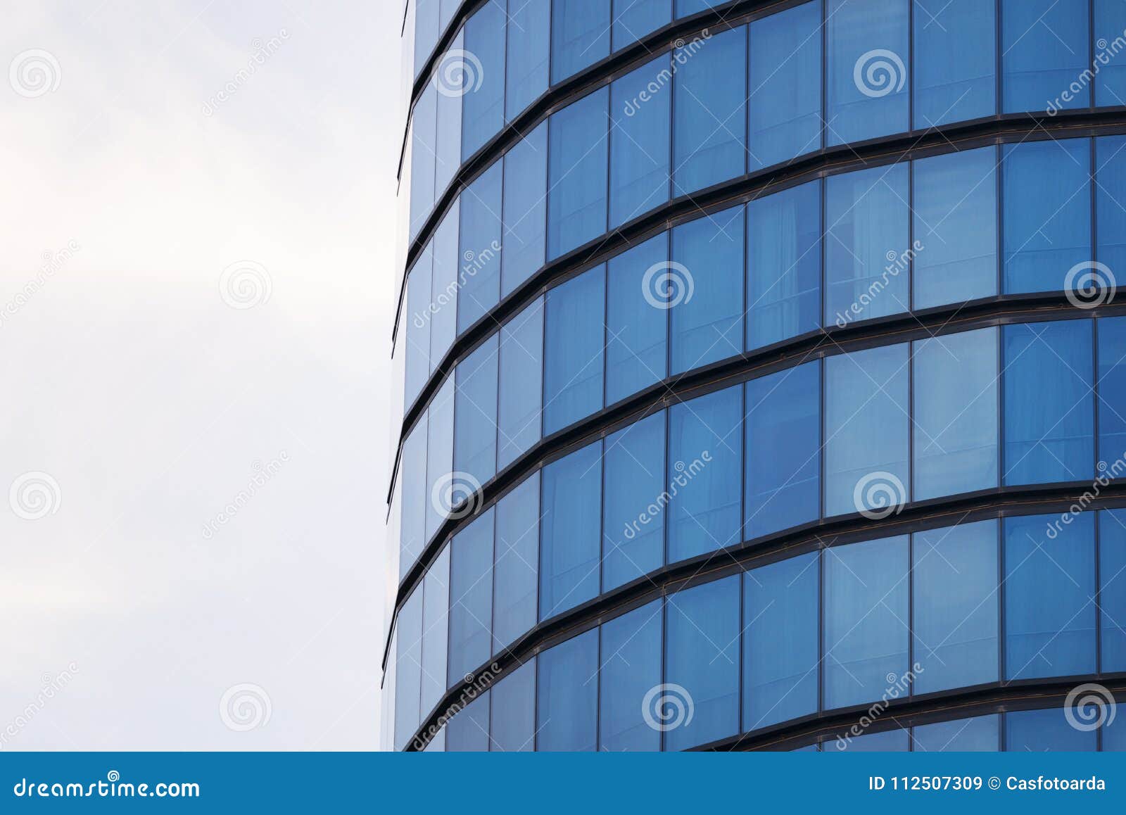 Blue Windows of a Cylindrical Building. Stock Image - Image of real ...