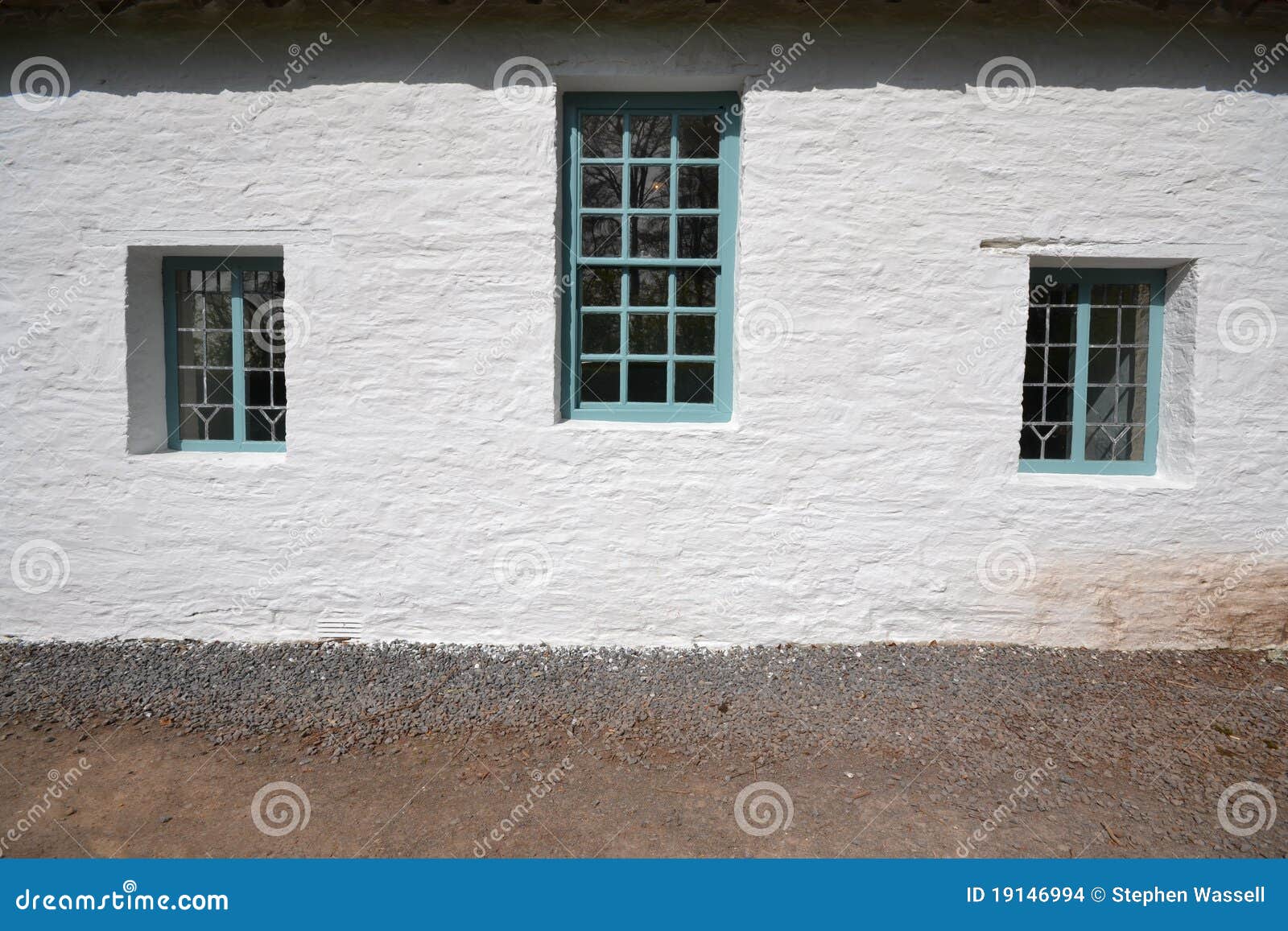 Blue windows white wall stock photo. Image of church - 19146994