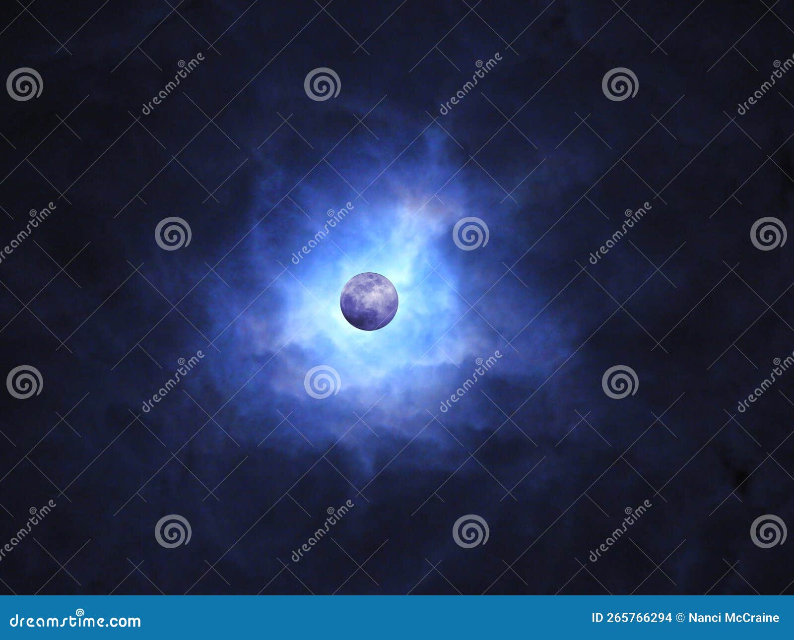 Violet Blue Wolf Moon Drifts through Blue Night Clouds Stock Photo ...