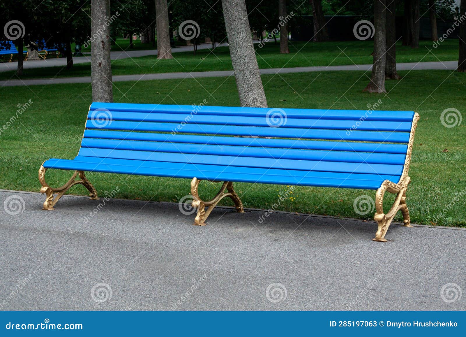 Blue Wooden Bench in the City Park Stock Image - Image of sunny, lawn ...