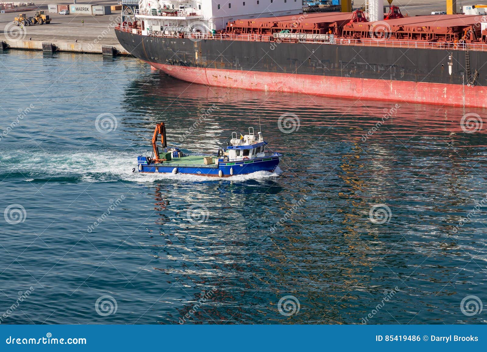 Blue Work Boat Past Tanker editorial photo. Image of work - 85419486