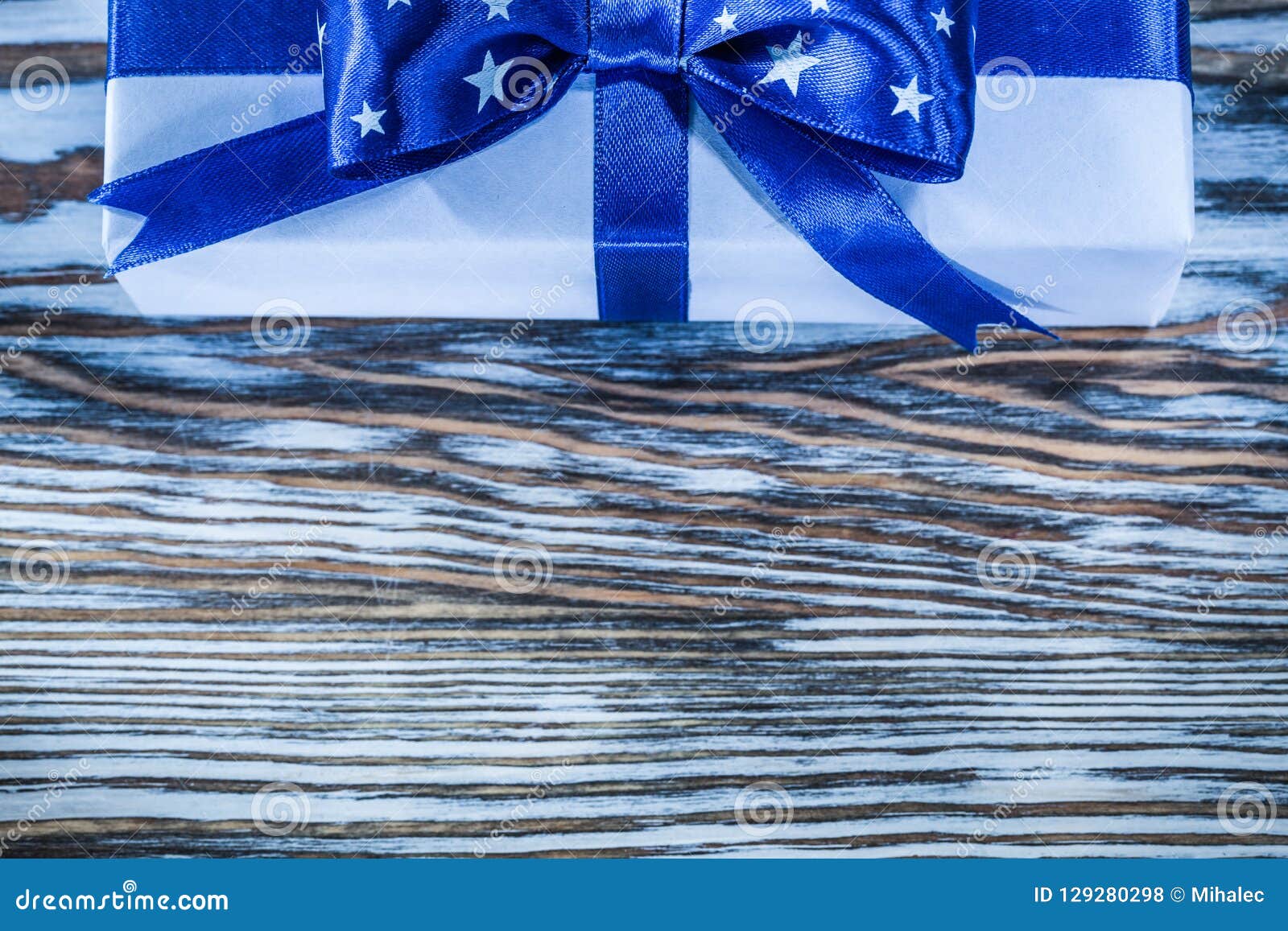 Blue Wrapped Present Box on Wooden Board Stock Photo - Image of giving ...