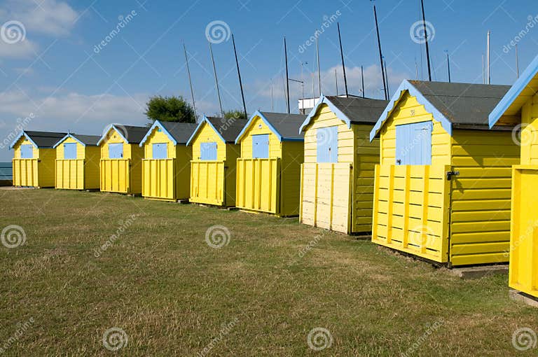 Blue and yellow beach huts stock photo. Image of regis - 15592268