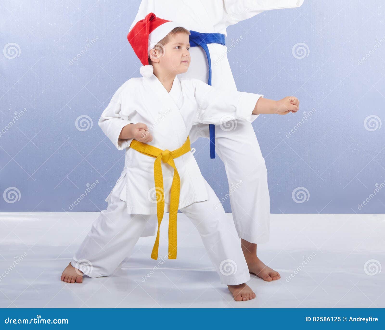 With Blue and Yellow Belt the Boys are Beating Punch Arm Stock Image ...