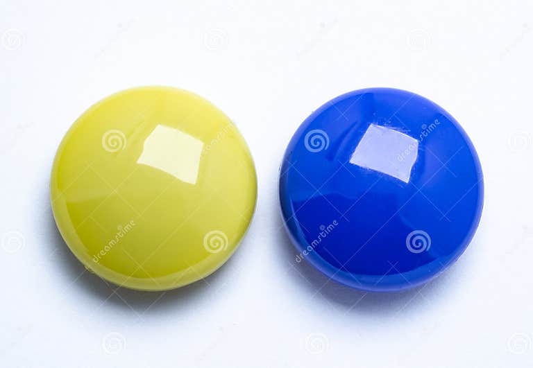 Blue and Yellow Buttons on White Background Stock Image - Image of ...