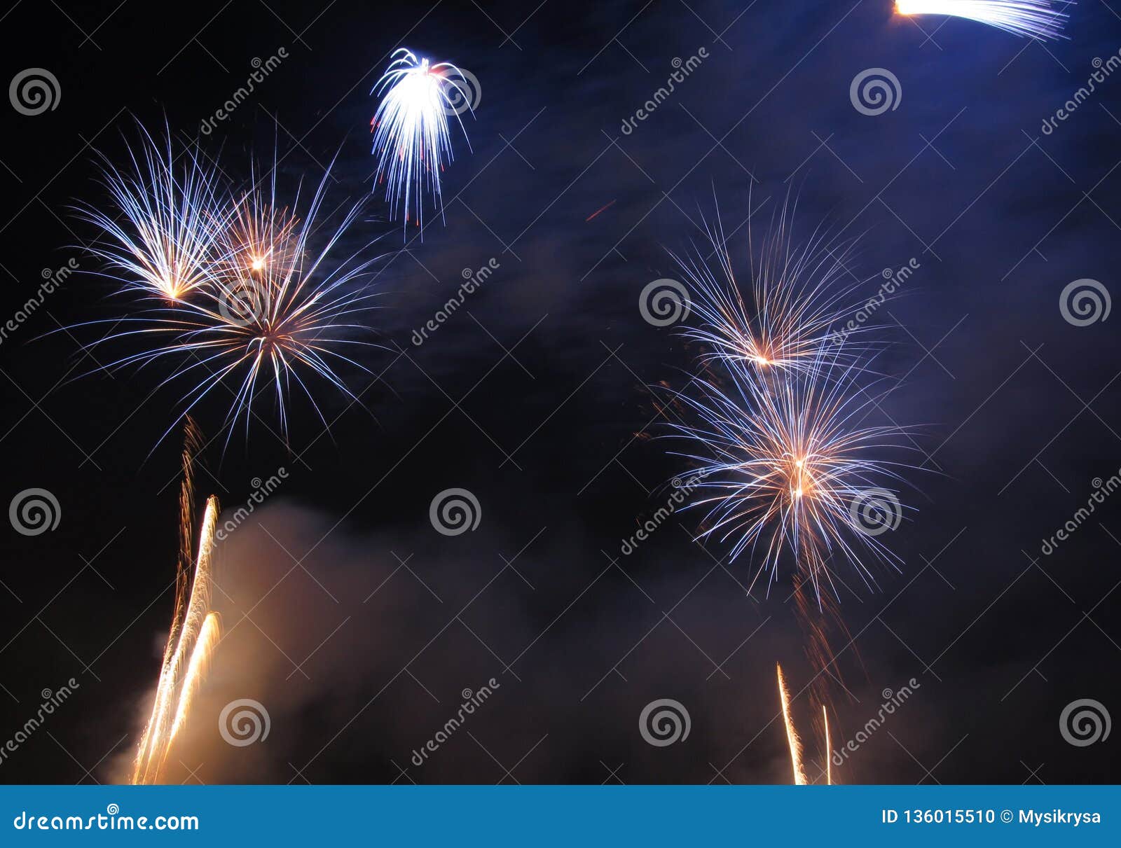 Blue and yellow fireworks stock photo. Image of year - 136015510