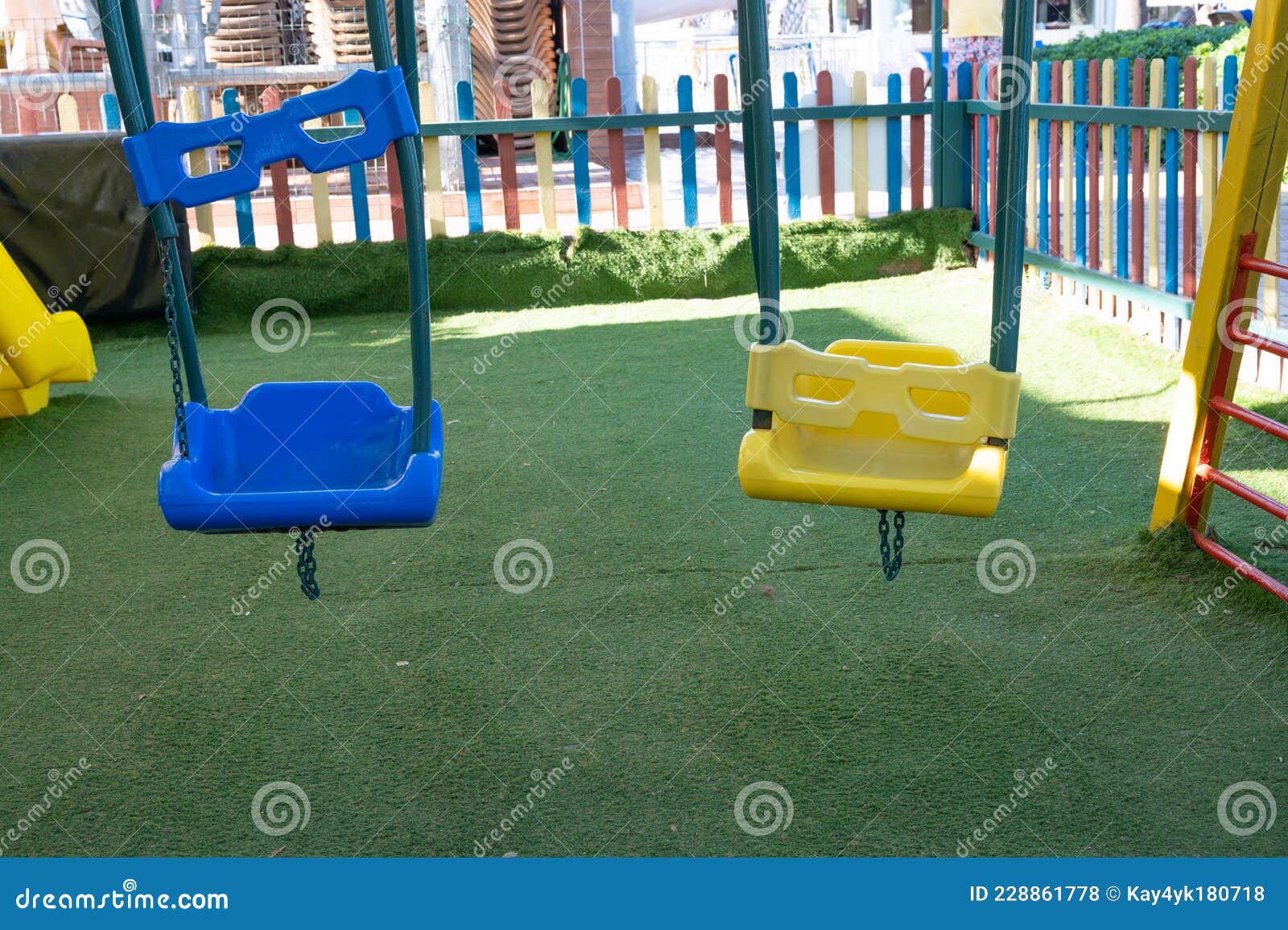 Blue and Yellow Swing for Children Stock Photo - Image of green ...