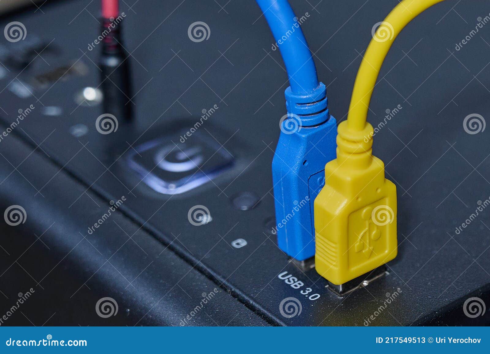 The Blue and Yellow USB Cables are Plugged into the Ports on the Front ...