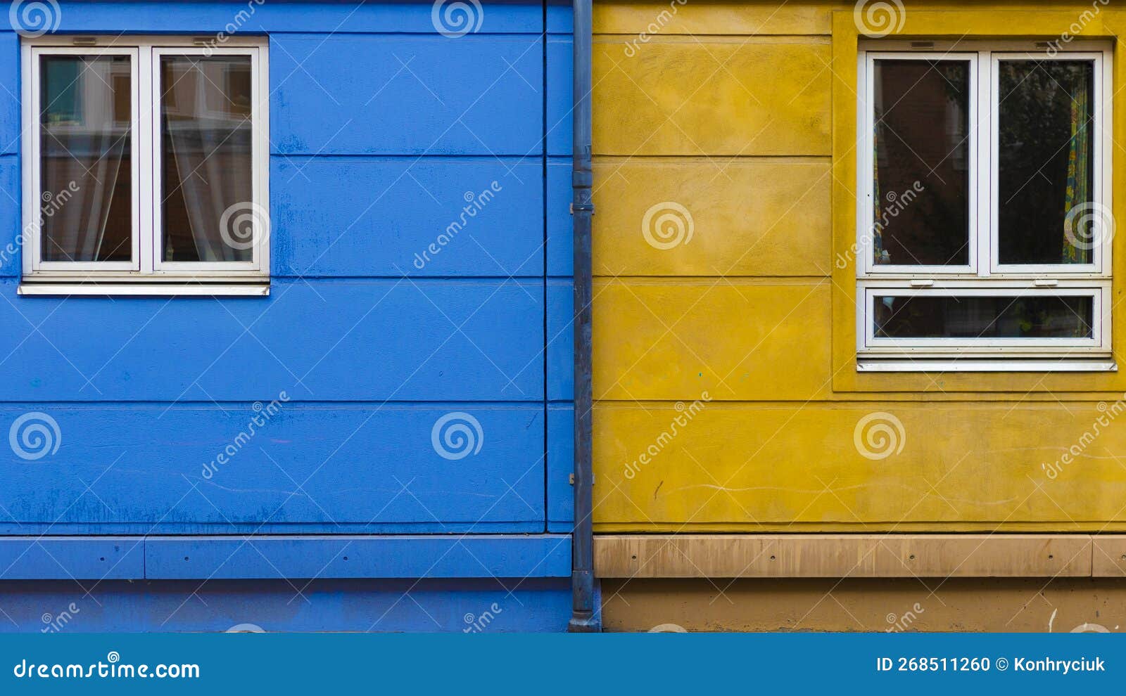 Blue and Yellow Wall with Windows Stock Photo - Image of glass ...