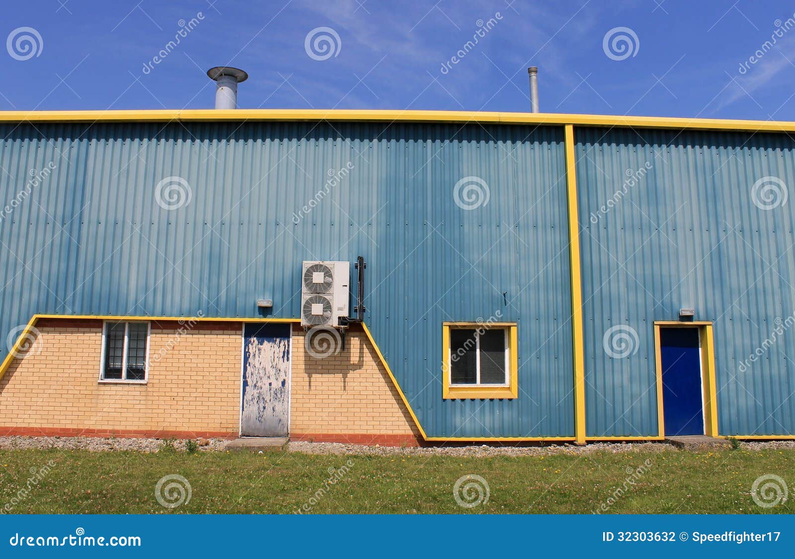 Blue and yellow warehouse stock photo. Image of building - 32303632