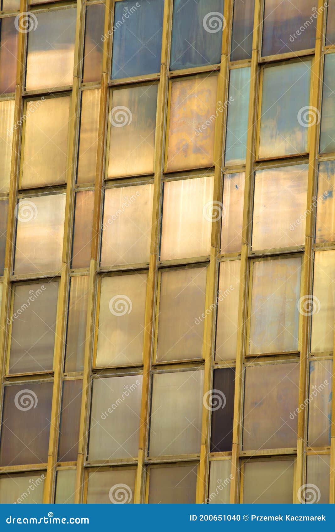 Blue and yellow windows. stock photo. Image of site - 200651040
