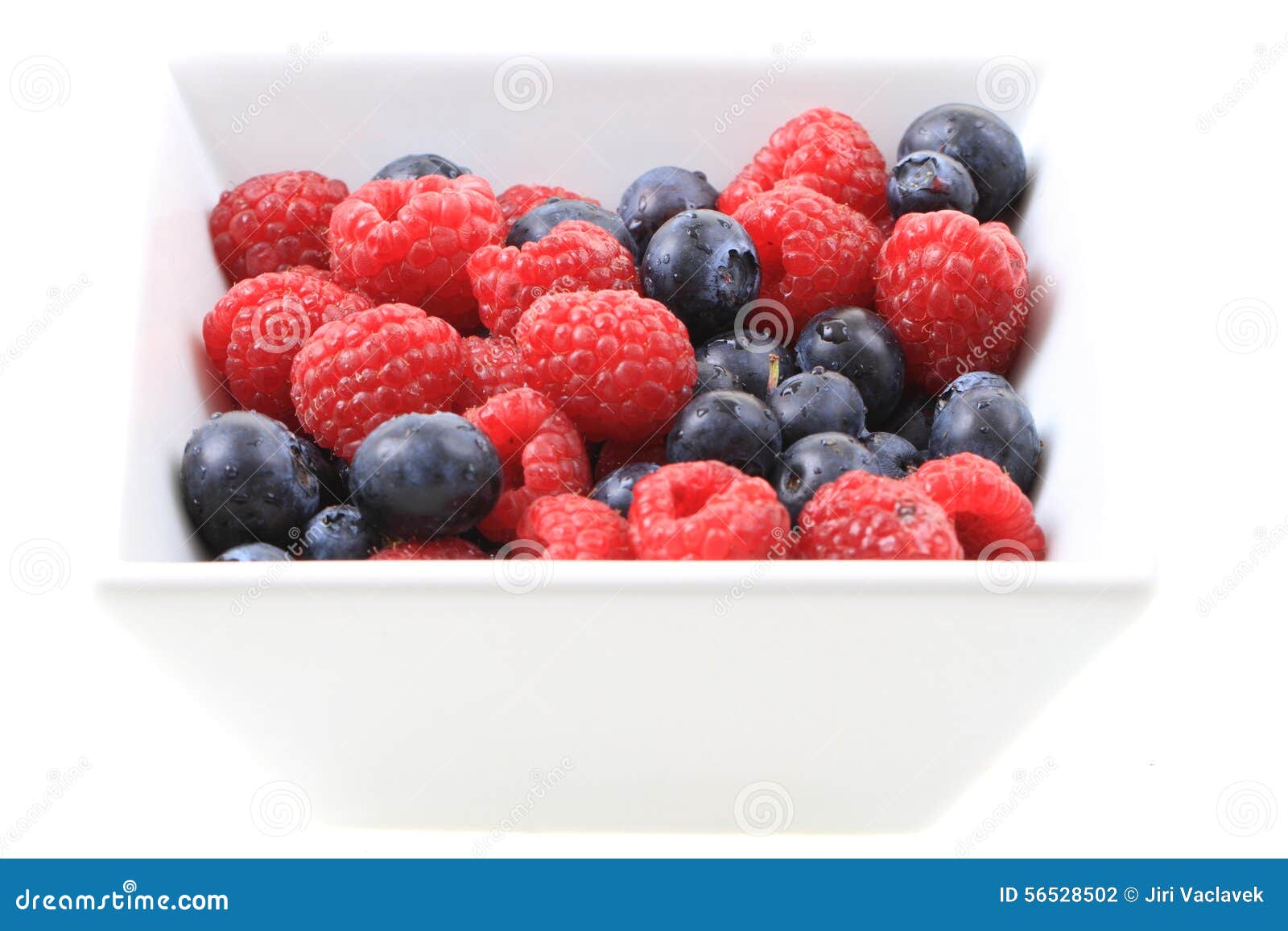 Blueberries ad raspberries stock photo. Image of freshness - 56528502