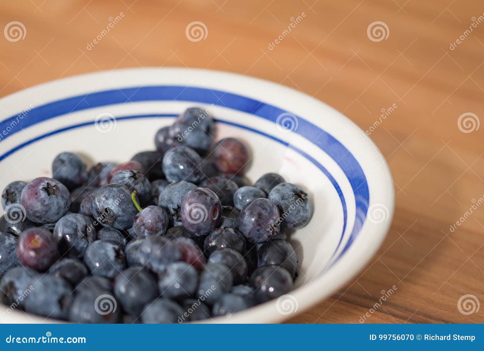 Blueberries in a bowl stock photo. Image of antioxidant - 99756070
