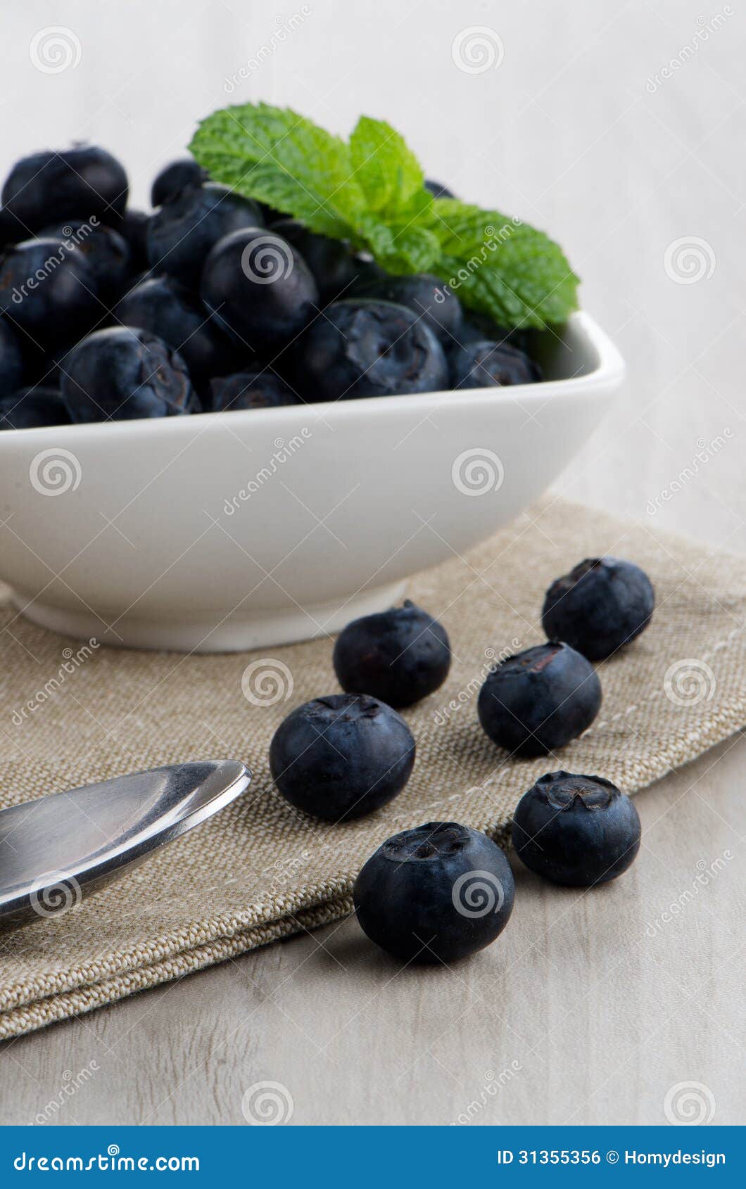 Blueberries in small bowl stock photo. Image of blueberry - 31355356