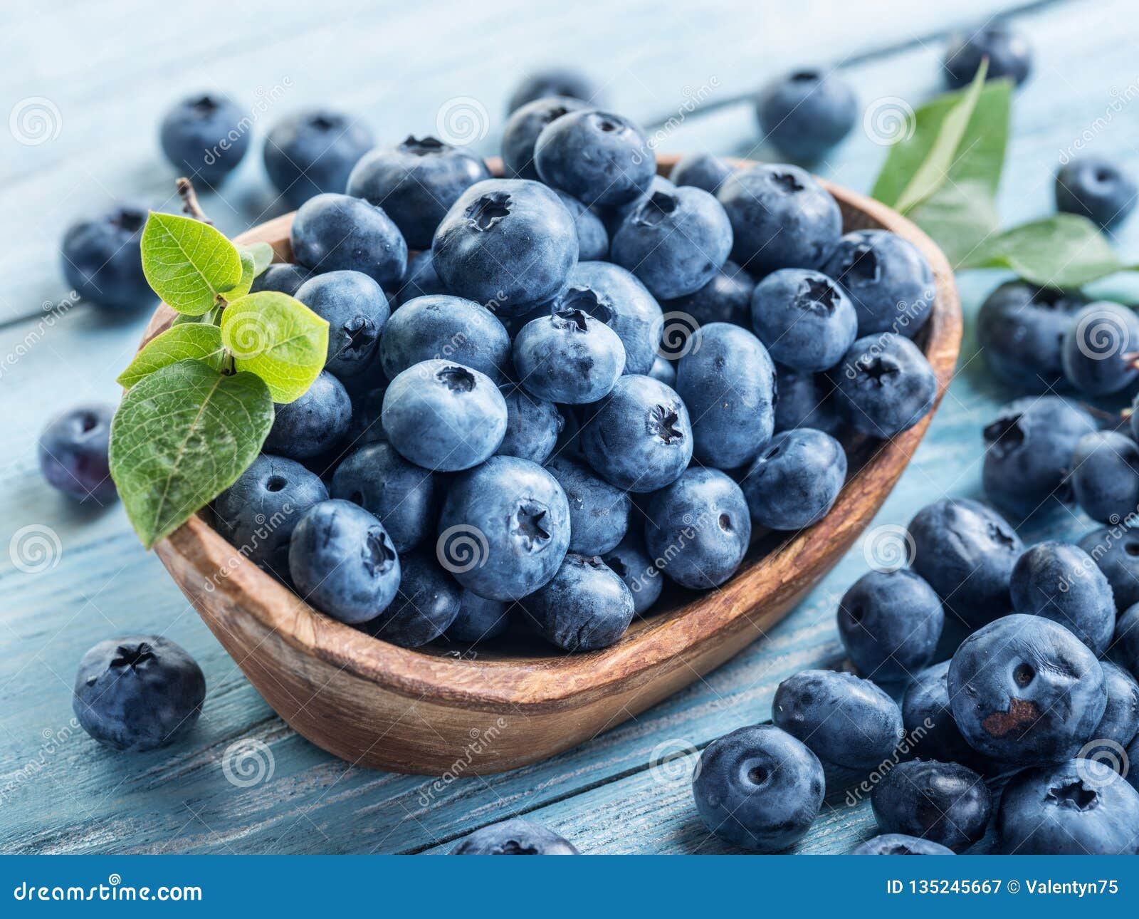 Blueberries in the Wooden Bowl on the Table Stock Image - Image of ...