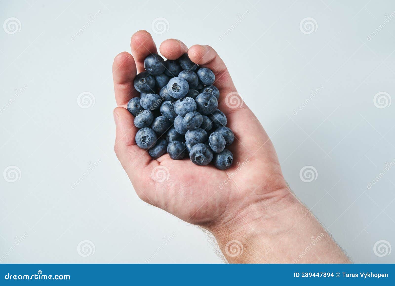 Blueberry in Hand on White. Male Hand Stock Photo - Image of full ...
