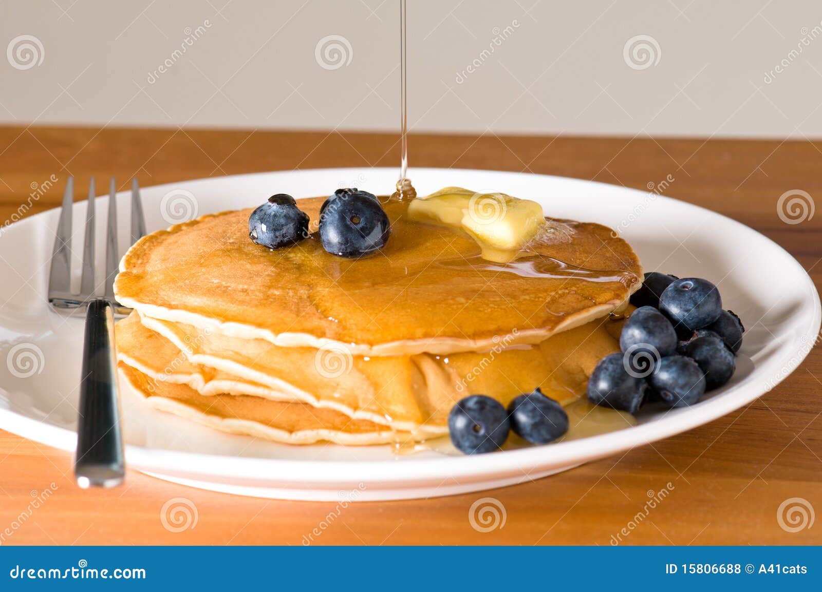 Blueberry Pancakes on a Plate with Fork Stock Photo - Image of butter ...