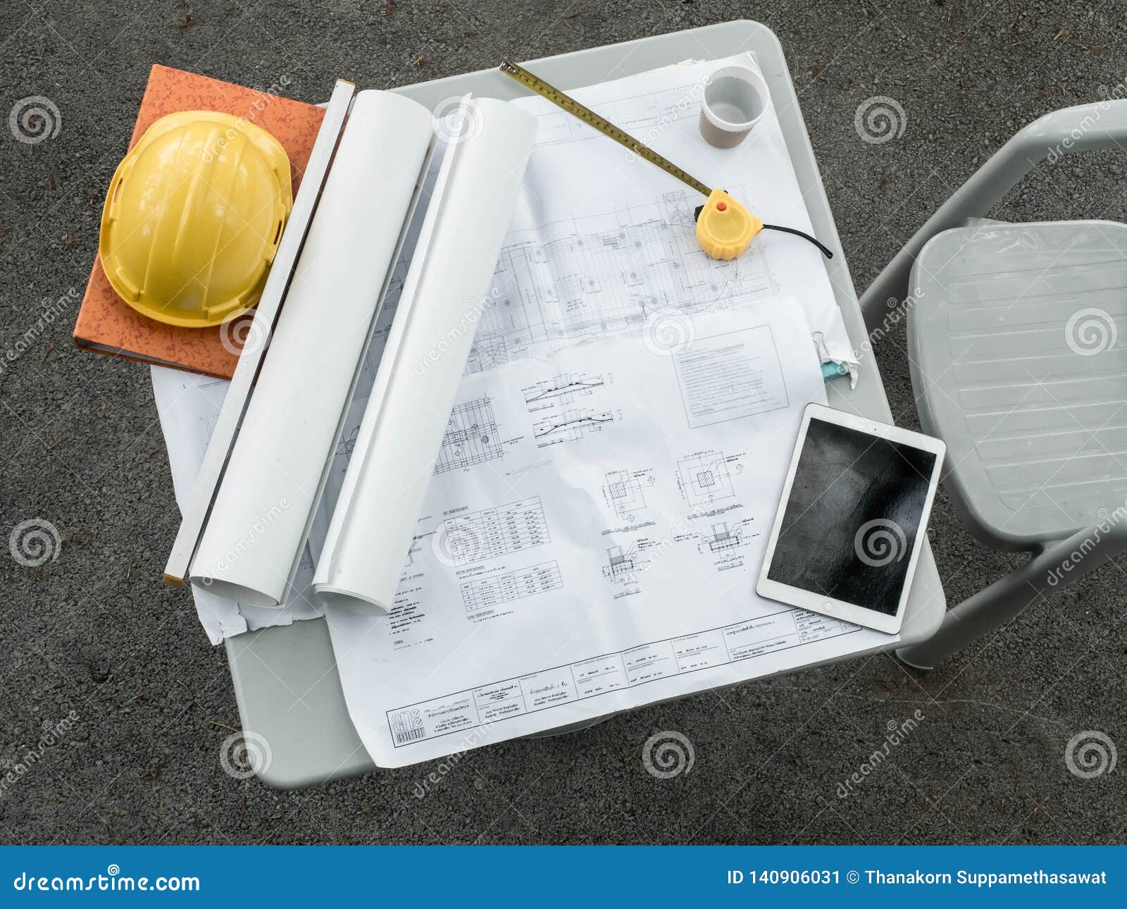 The Blueprint is Placed on the Desk Waiting for Work and the ...