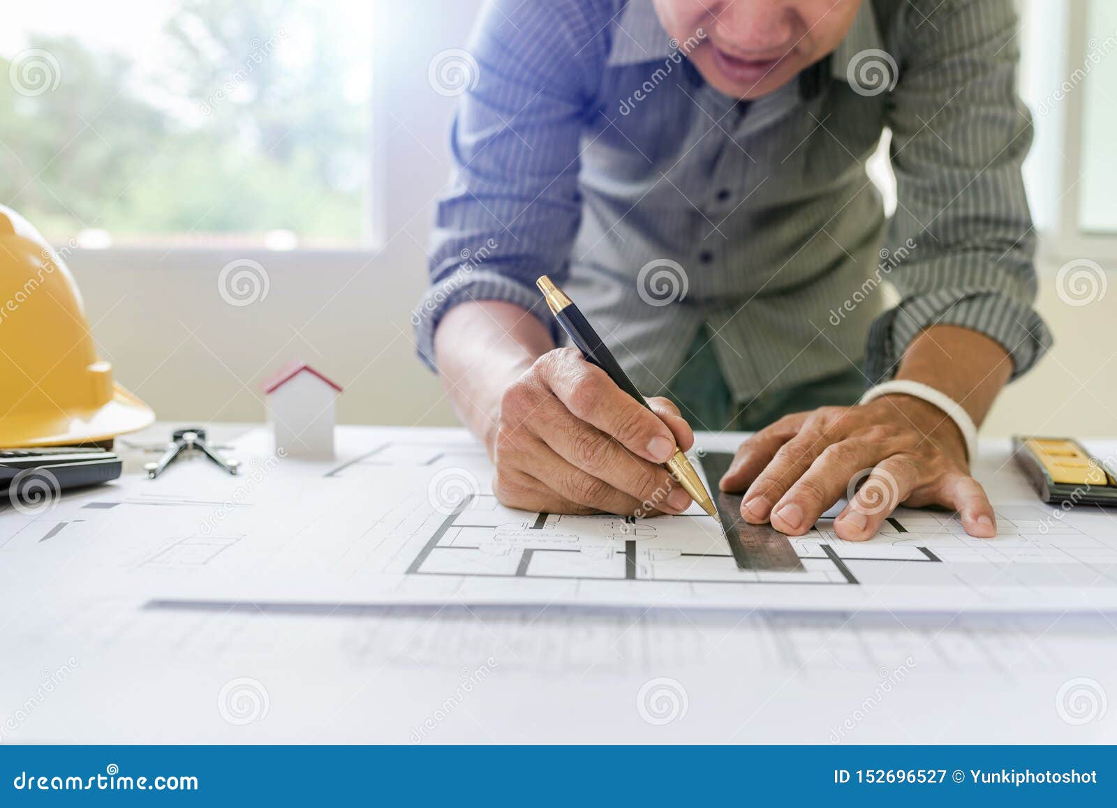 Blueprints of Designer and Engineers Working at Architects Office Stock ...