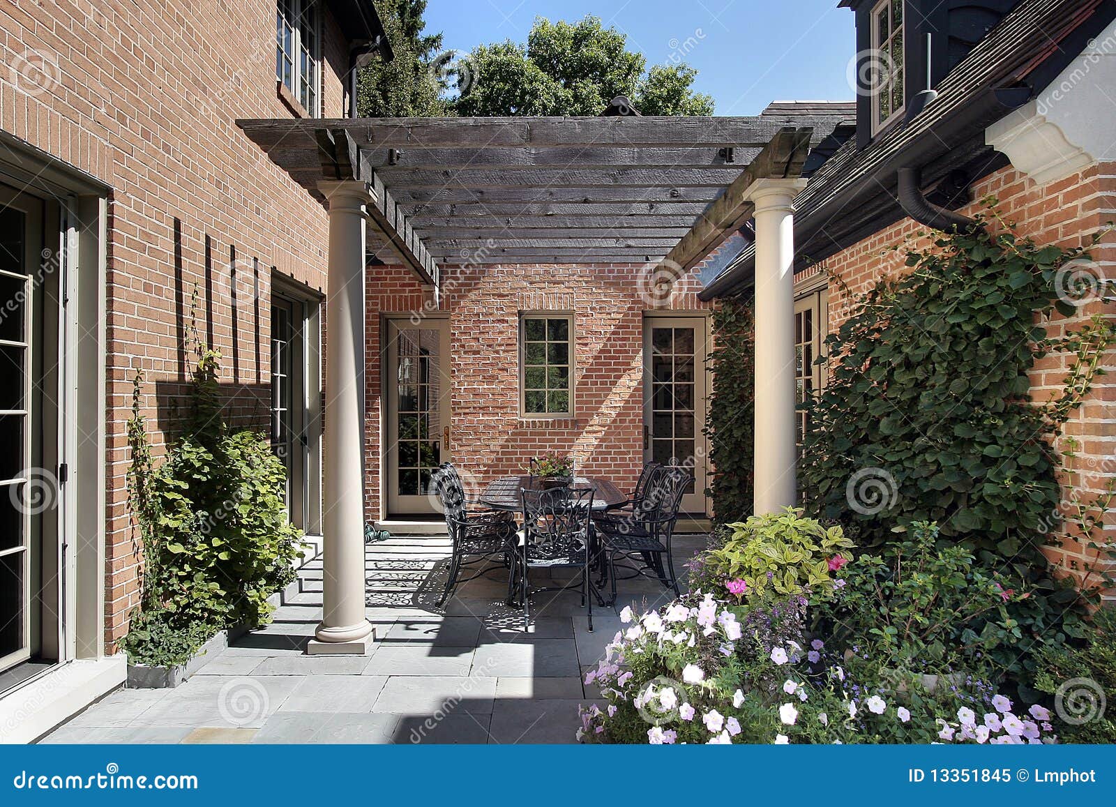 Bluestone Patio and Wood Pergola Stock Image - Image of chair, lawn ...