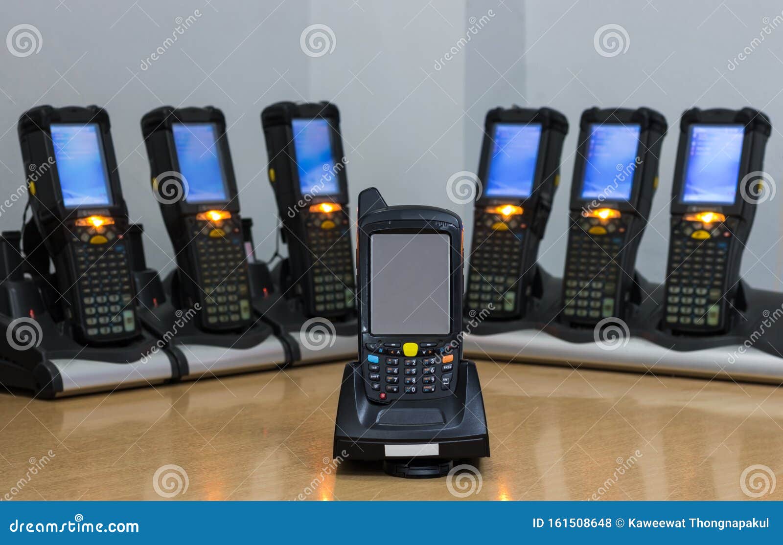 Bluetooth Barcode Scanners are Charging on the Table. Use for the Work ...