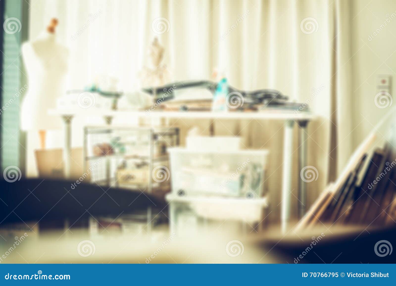 Blur of Modern Workshop or Studio with Dummy ,table and Various Tools ...