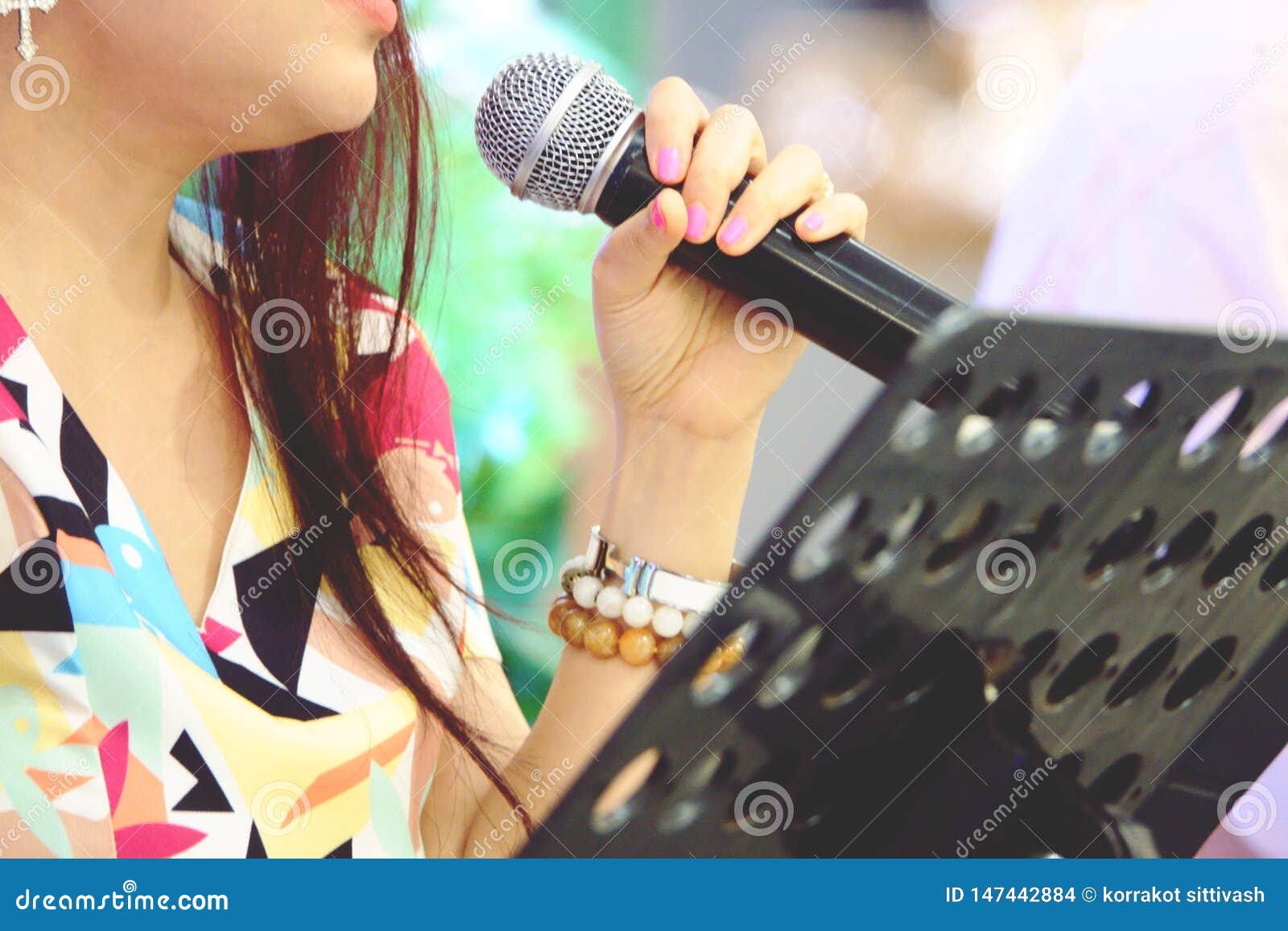 Blurred Asia Singer Hands Holding Microphone on Stage Stock Photo ...
