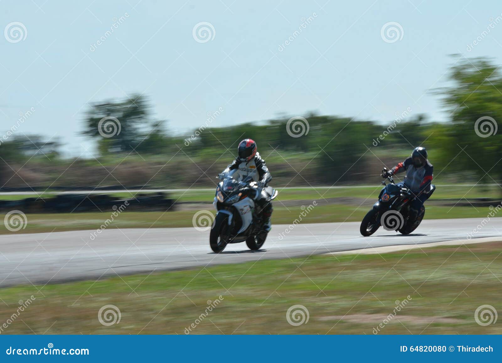 Blurred Athletes Practicing Racing Motorcycles on the Race Track Stock ...