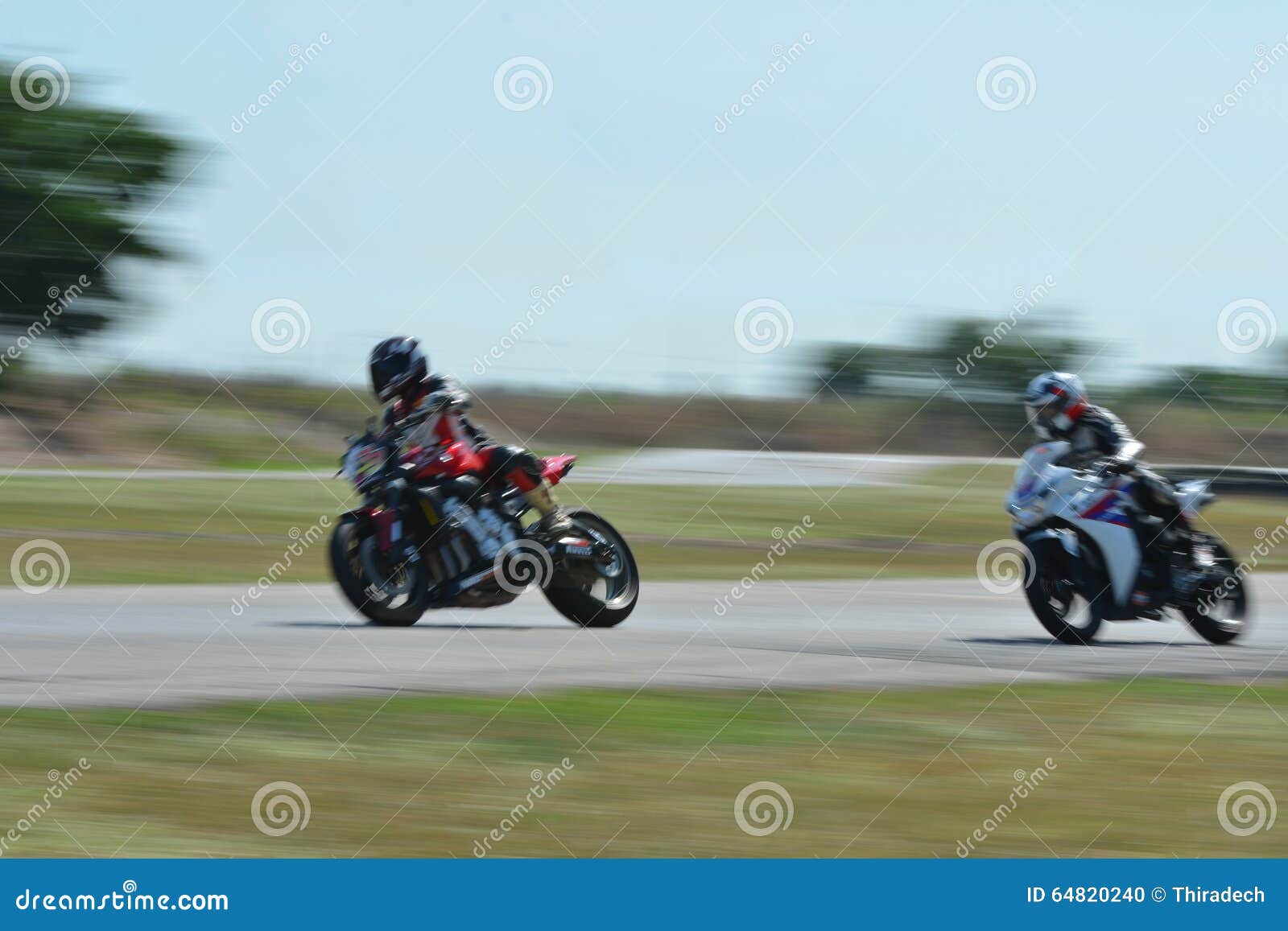 Blurred Athletes Practicing Racing Motorcycles on the Race Track Stock ...