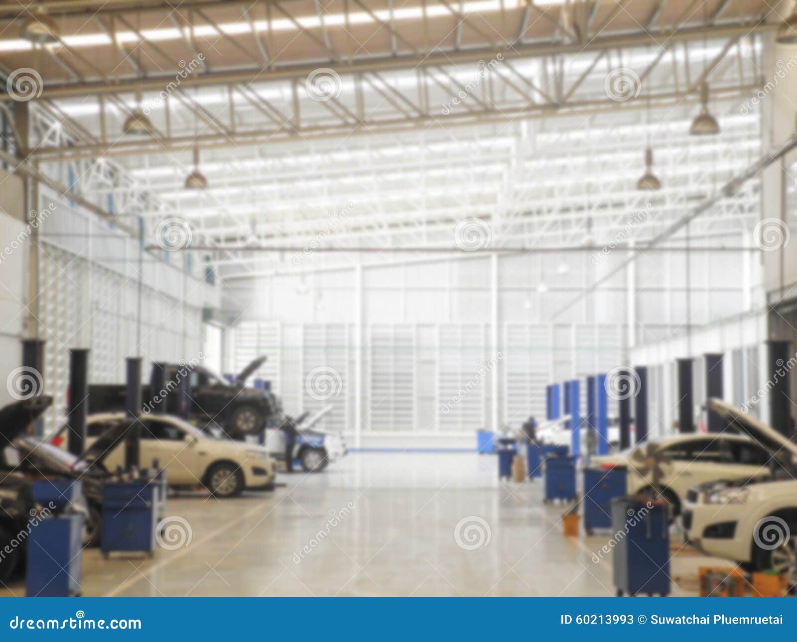 Blurred Background : Car Technician Repairing the Car in Garage Stock ...