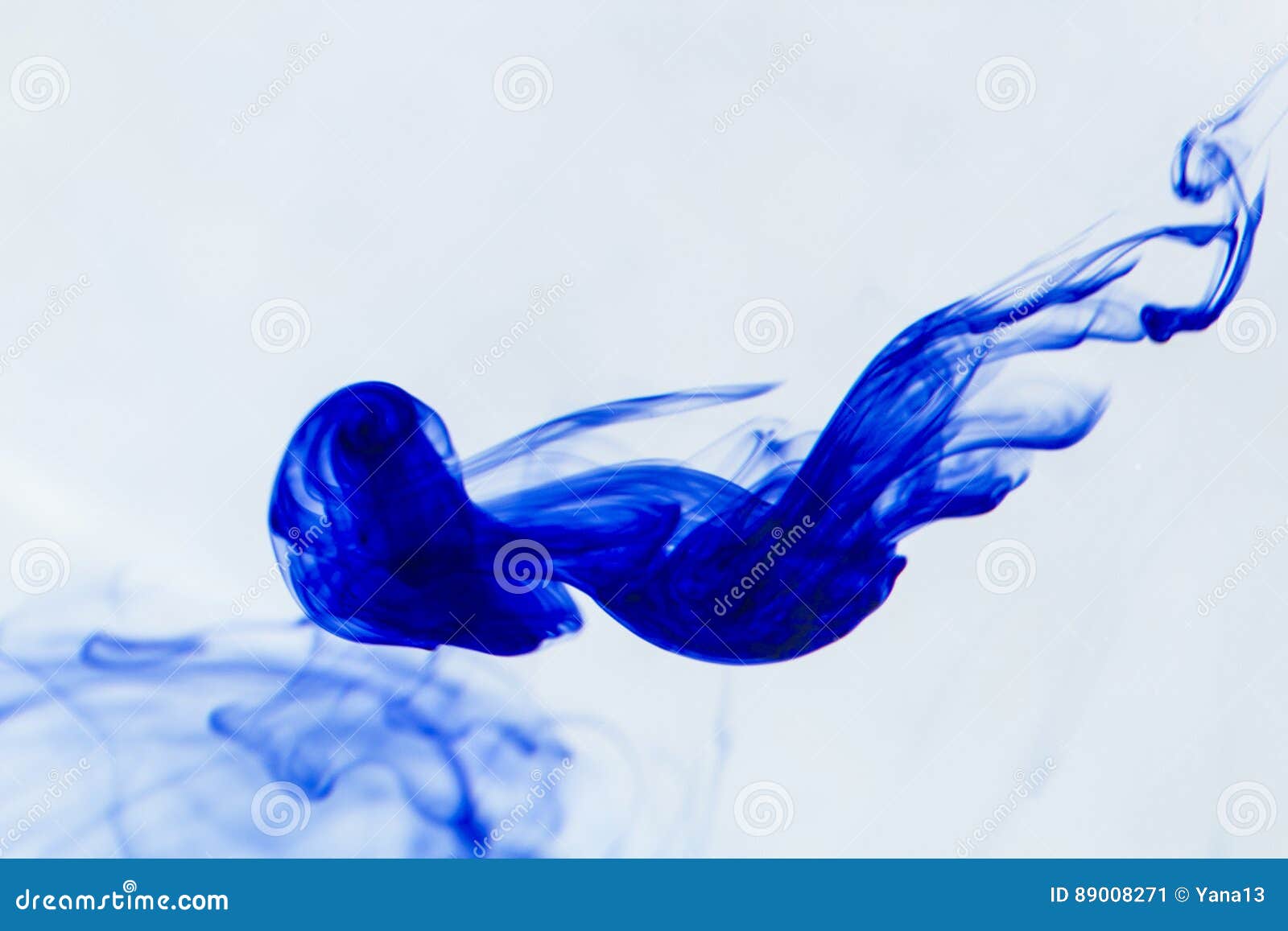Blurred blue ink in water stock image. Image of fluid - 89008271