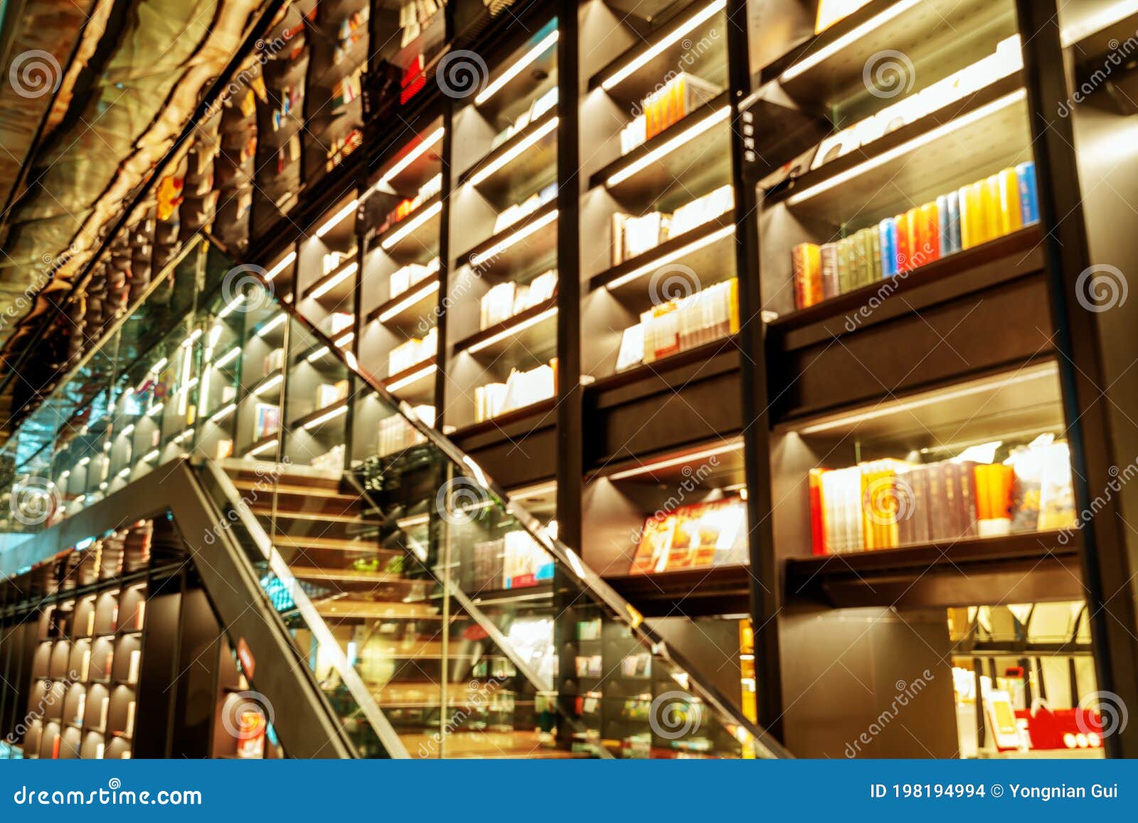 Blurred Books in Public Library. Blur Effect. Background Stock Photo ...