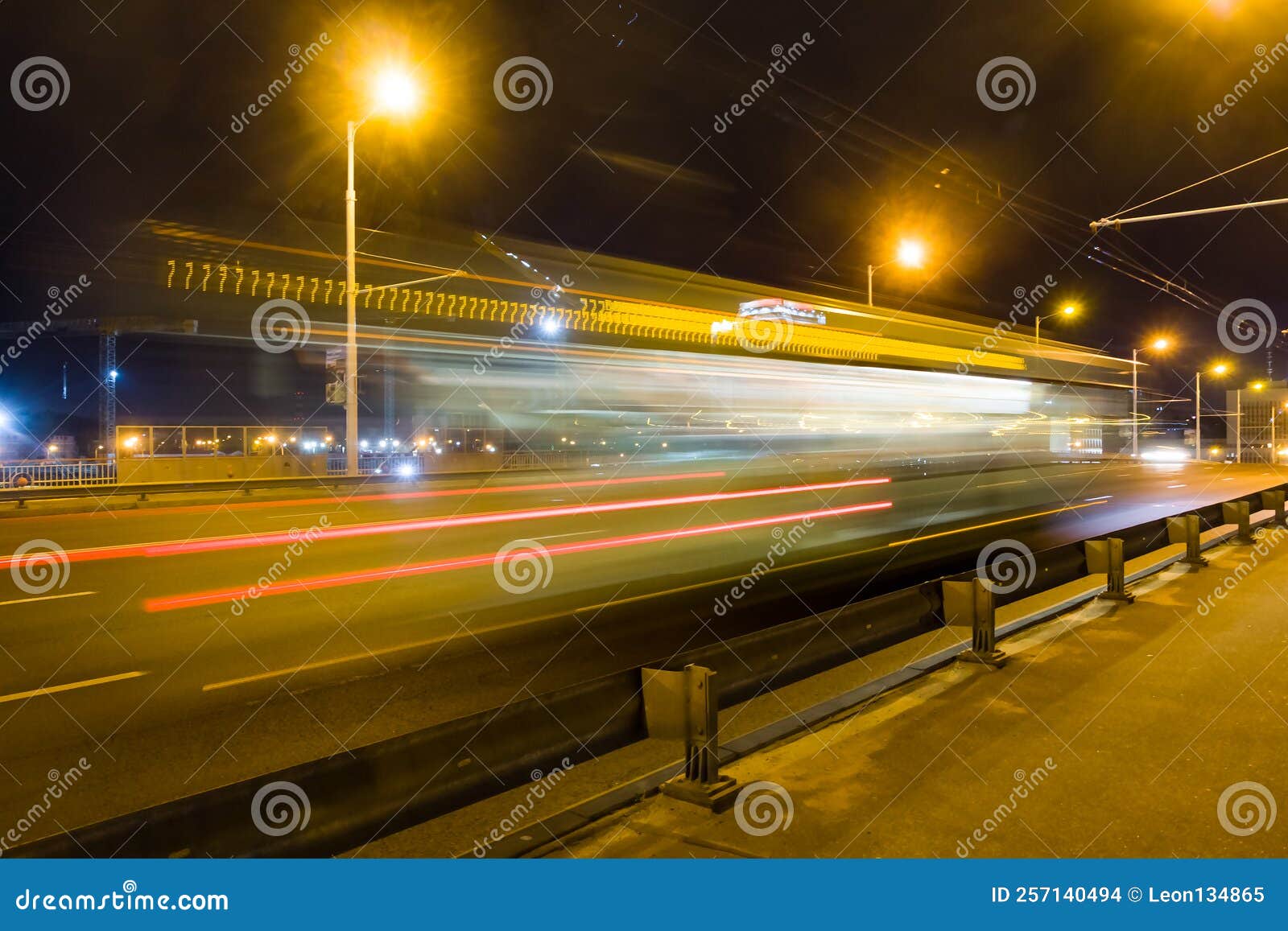 A Blurred Bus Moves Along the Overpass Stock Photo - Image of pillar ...