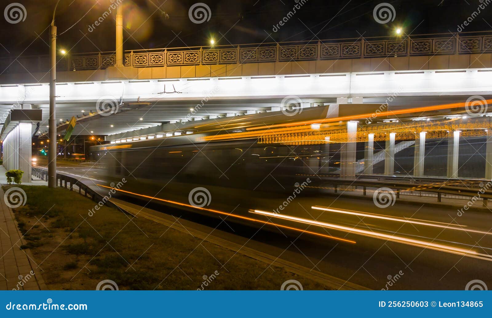Blurred Bus Traffic Under the Overpass Stock Image - Image of fence ...
