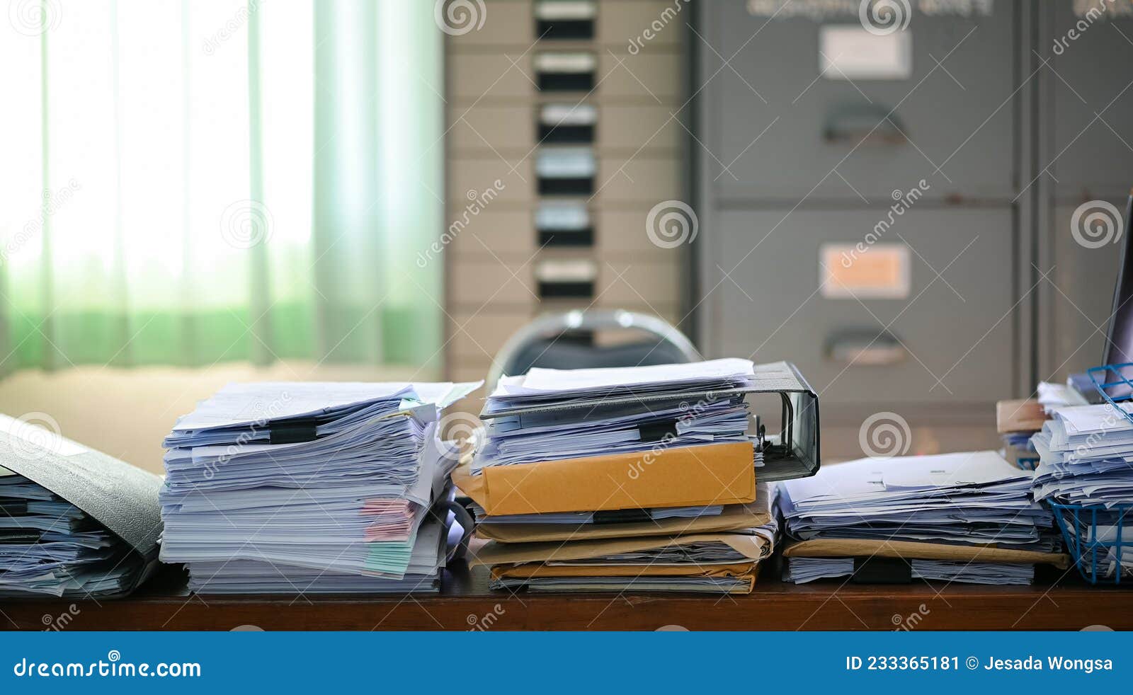 Blurred Busy Cluttered Desk Workplace, Full of Documents a Mess Desk ...